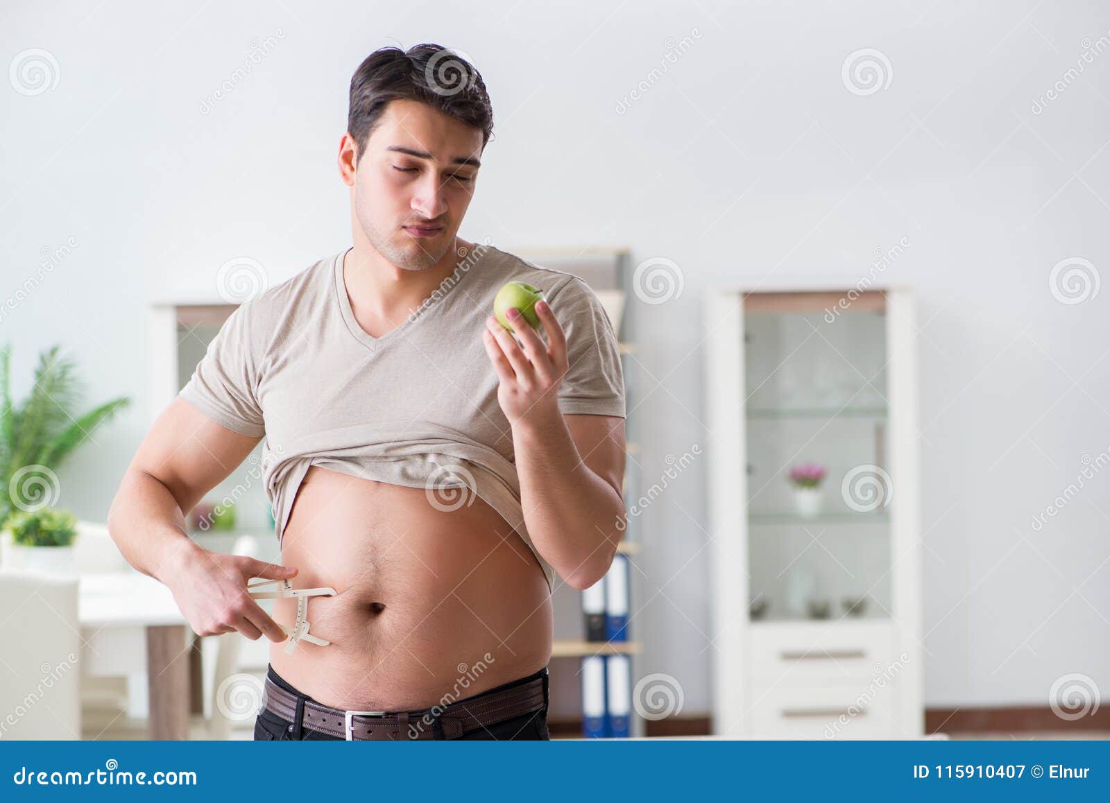 The Man Measuring Body Fat with Calipers Stock Image - Image of health ...