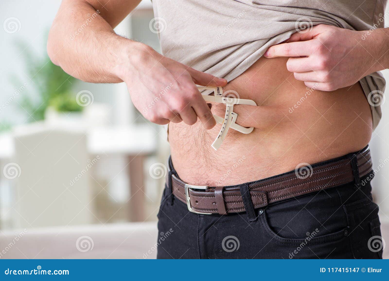 The Man Measuring Body Fat with Calipers Stock Image - Image of obesity ...