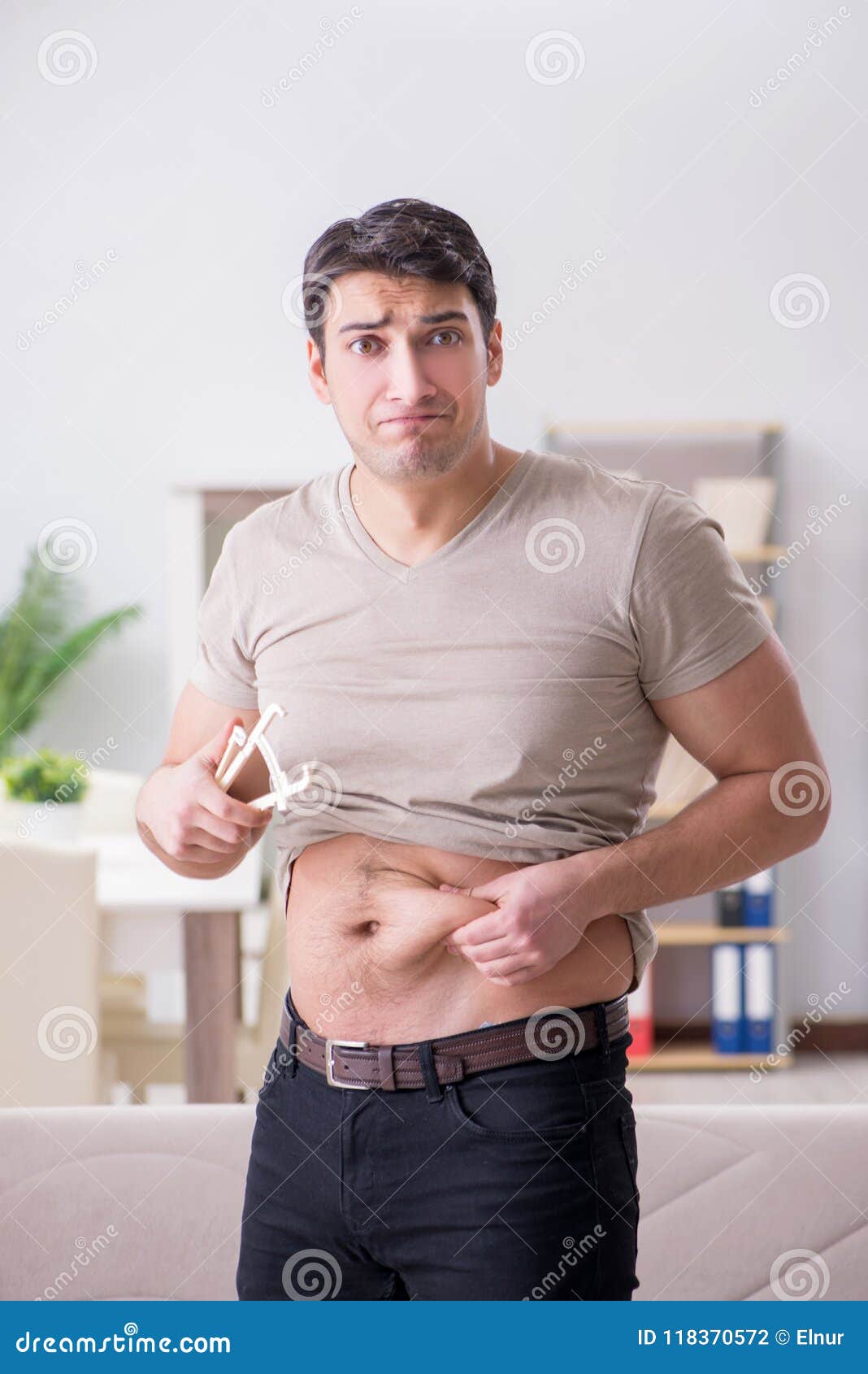 The Man Measuring Body Fat with Calipers Stock Photo - Image of extra ...
