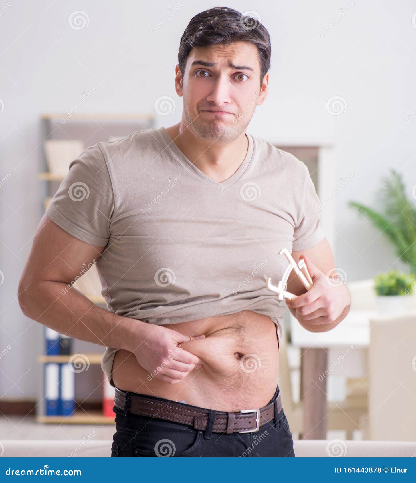 Man Measuring Body Fat with Calipers Stock Photo - Image of diet ...