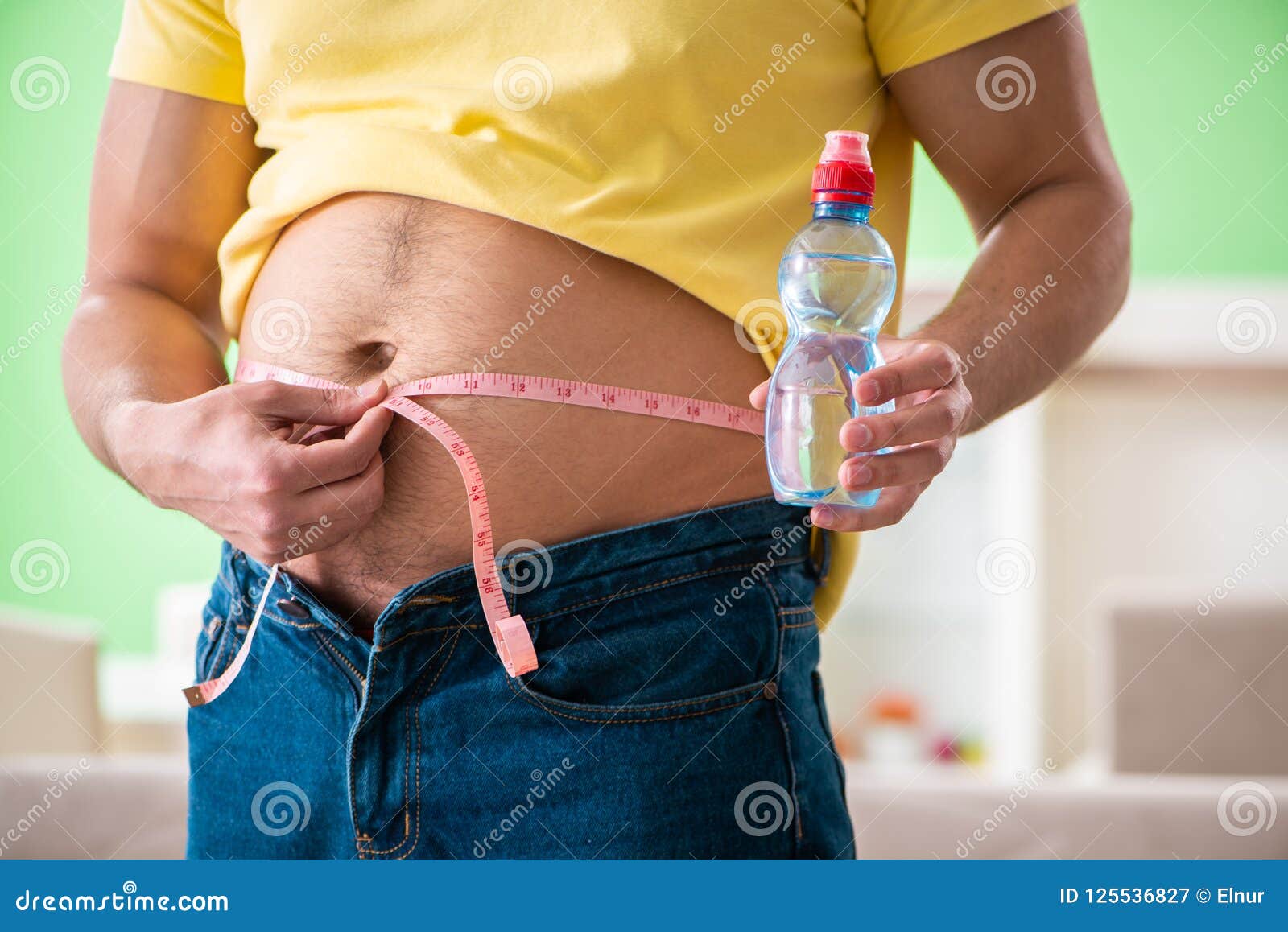 The Man Measuring Body Fat with Tape Measure in Dieting Concept Stock ... The Man Measuring Body Fat with Tape Measure in Dieting Concept Stock ...