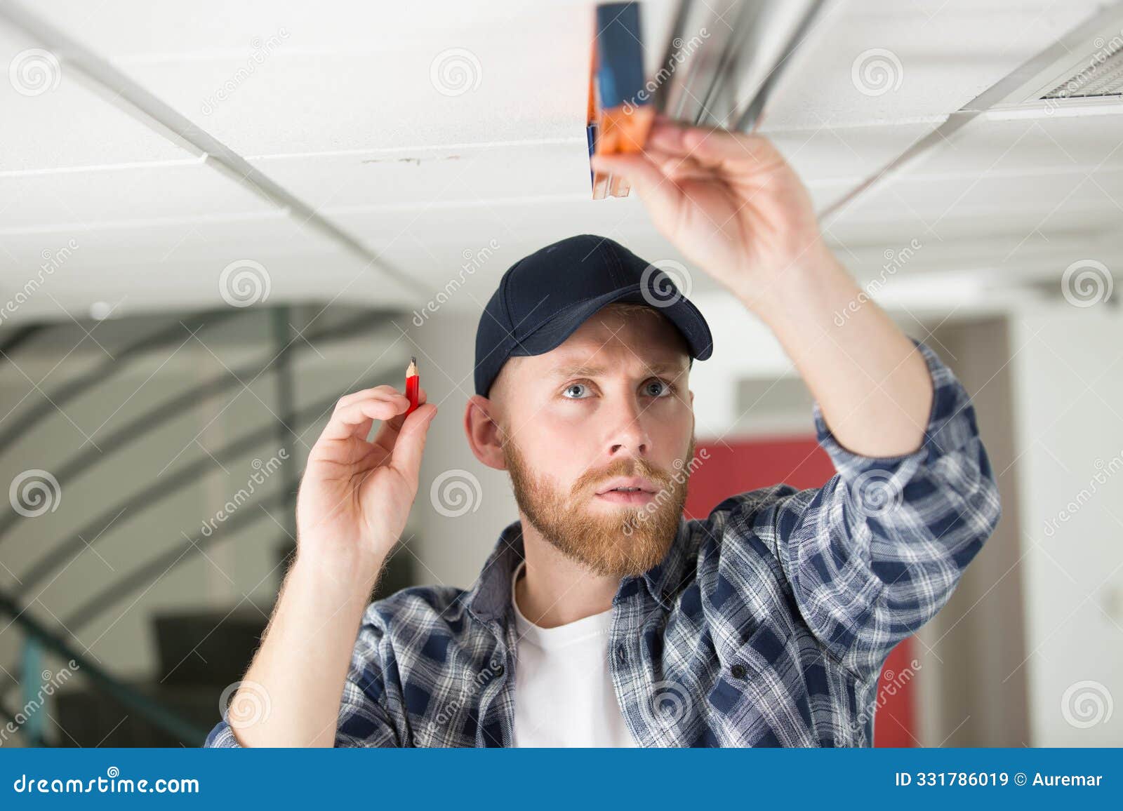 Man Is Measuring The Ceiling For Gypsum Baseboard. Maintenance Repair ...