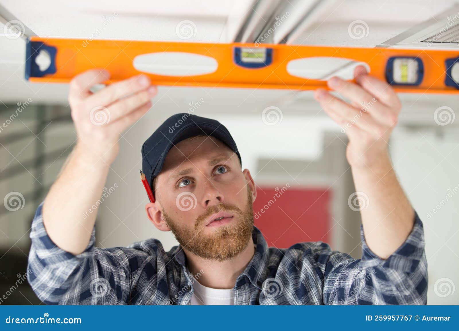 Man Measuring Ceiling with Sprit Level Stock Image - Image of ...