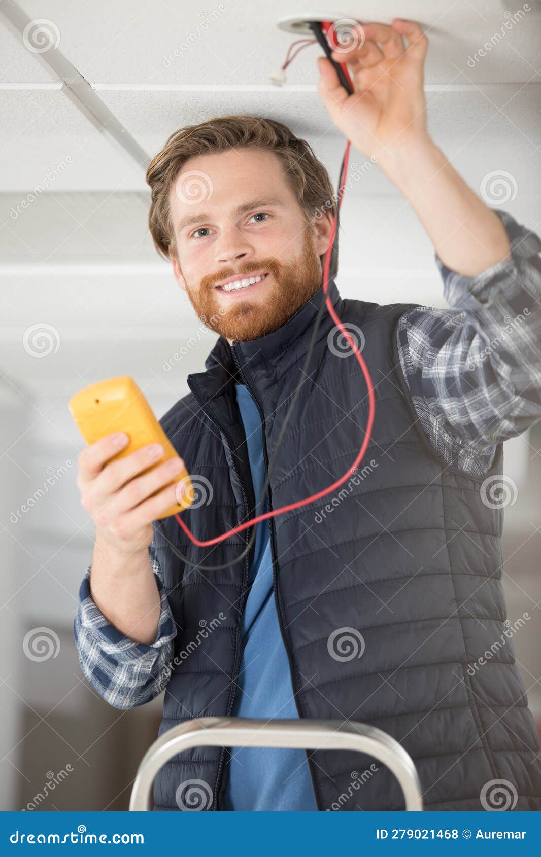 Man Measuring and Cheking Power Supply Voltage with Digital Multimeter ...