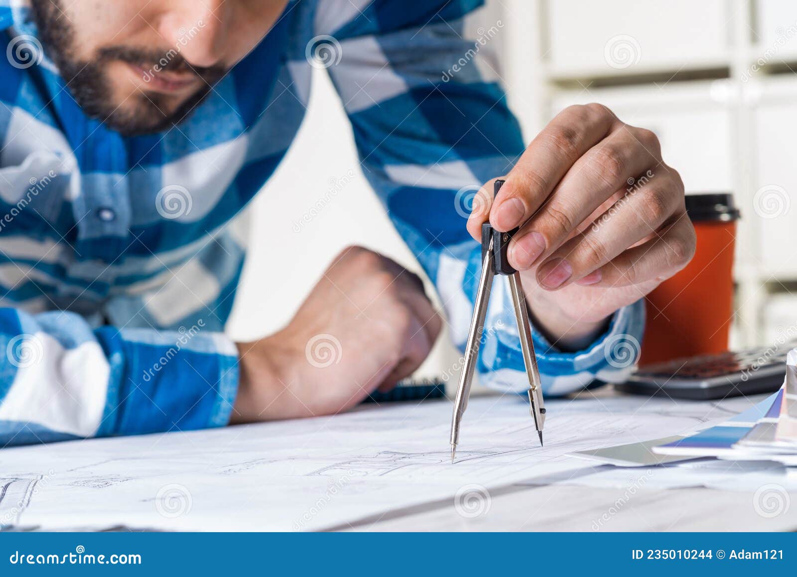 Man Measuring with Compass Divider on Blueprint Stock Photo - Image of ...