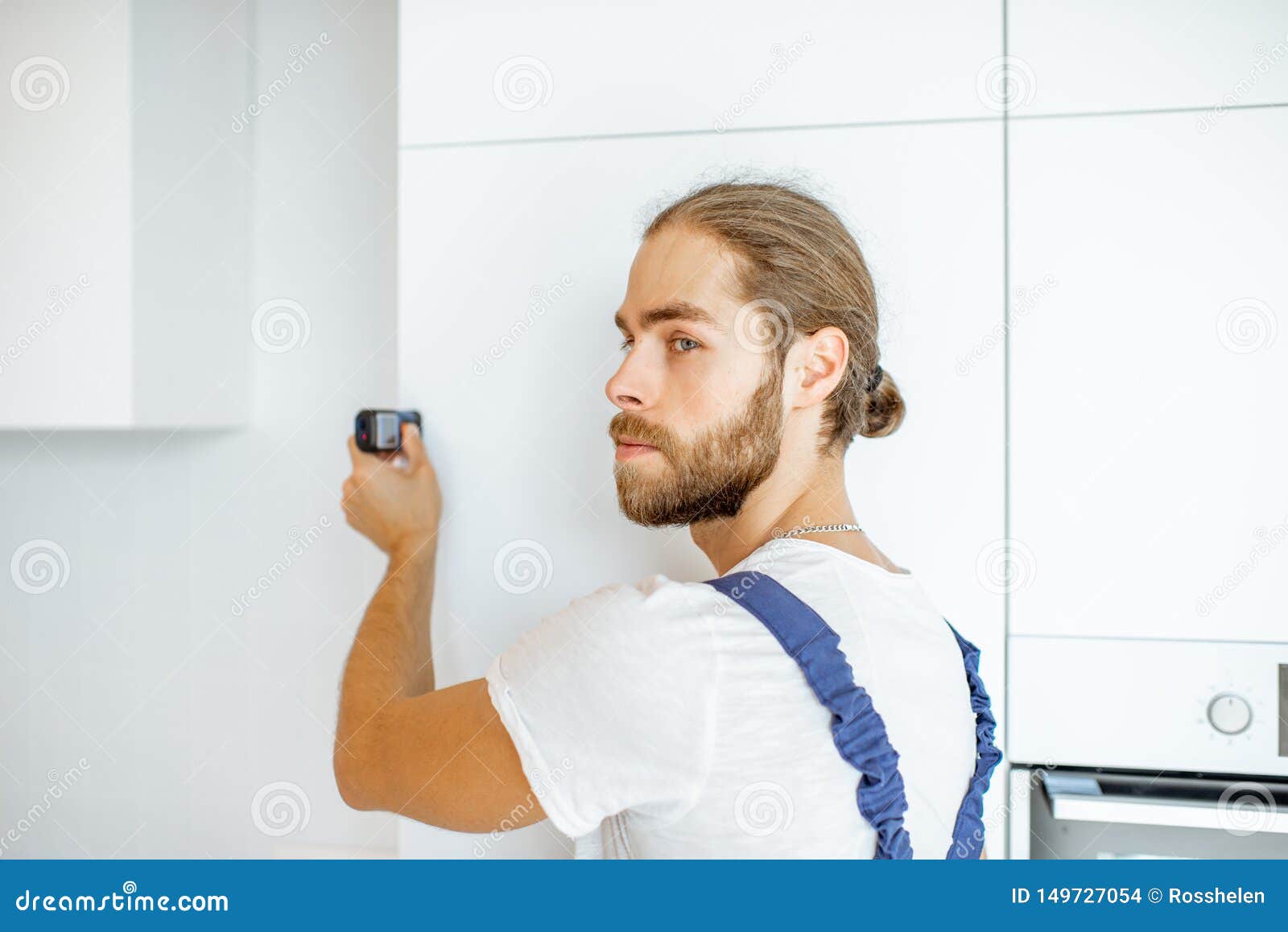 Man Measuring Distances at Home Stock Photo - Image of contractor ...