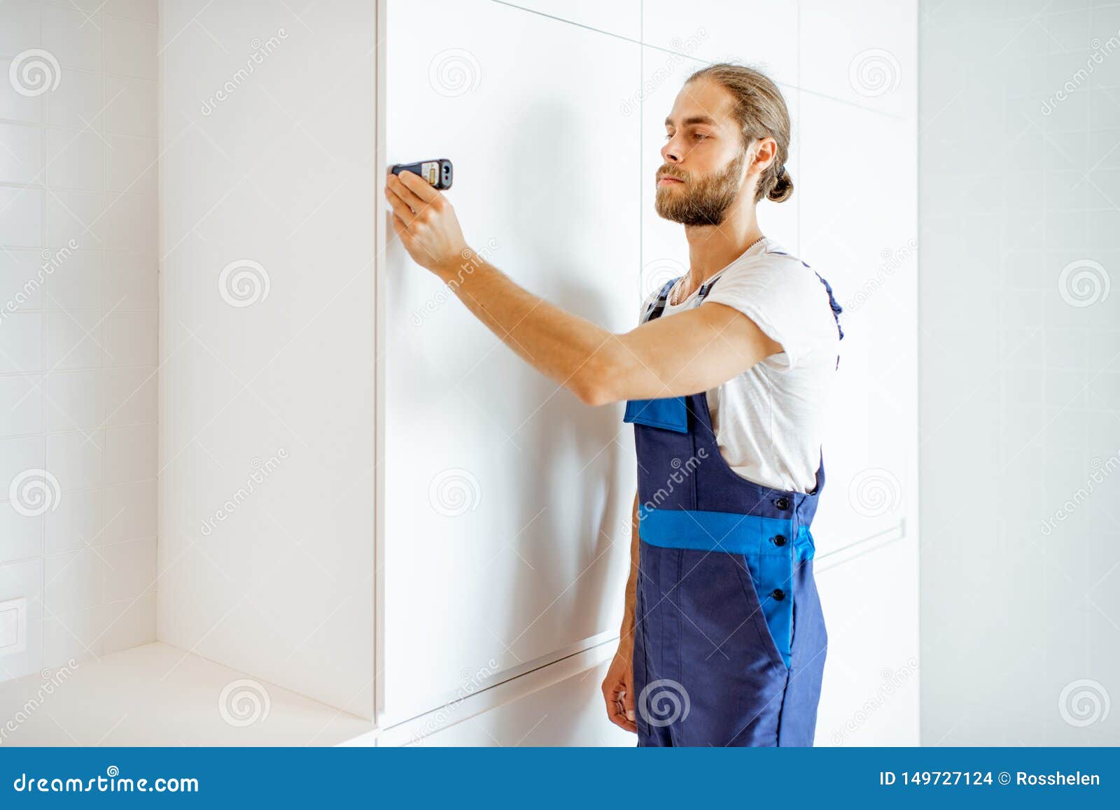 Man Measuring Distances at Home Stock Photo - Image of caucasian ...