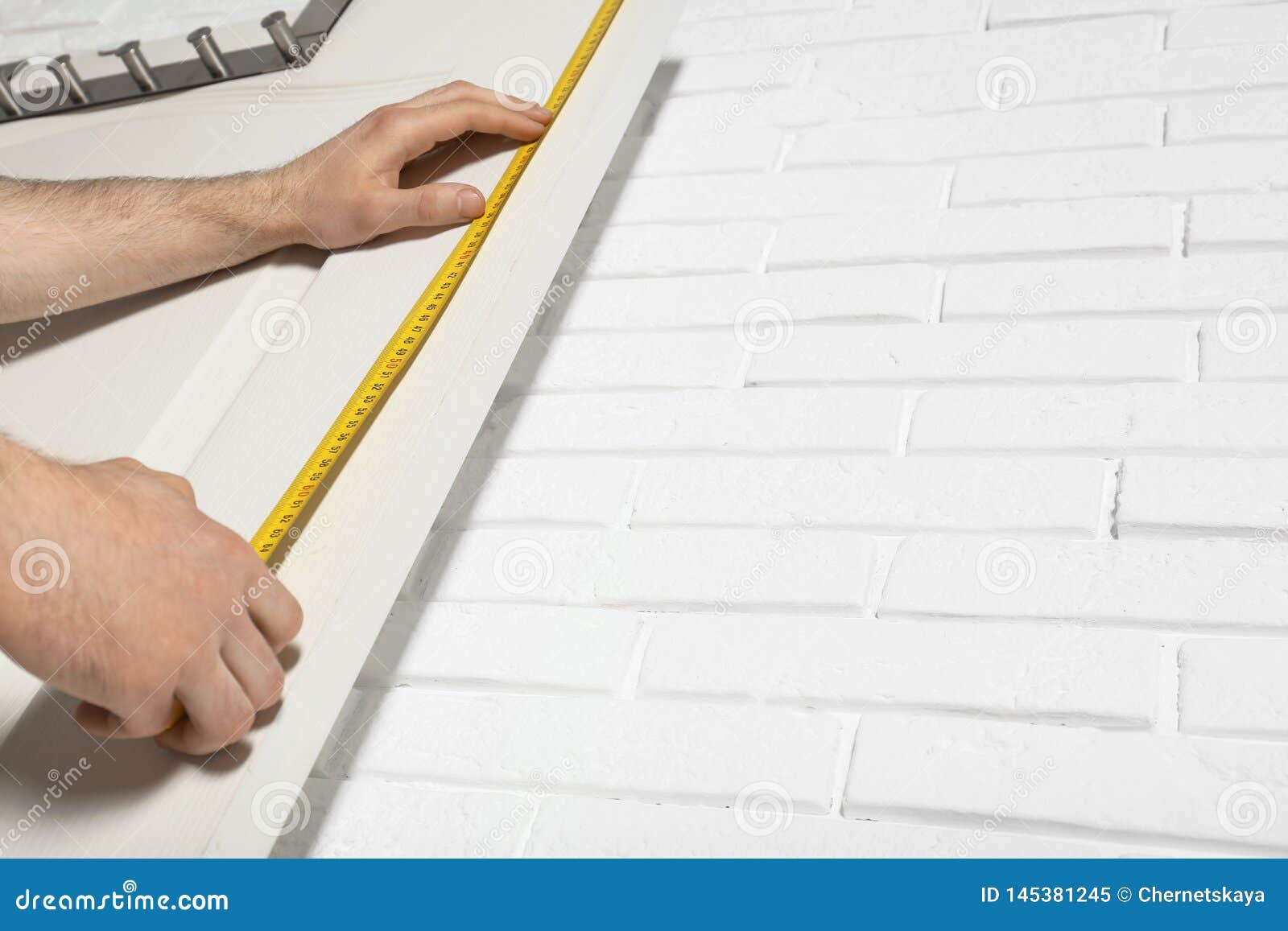 Man Measuring Door in Room, Closeup. Stock Image - Image of engineering ...
