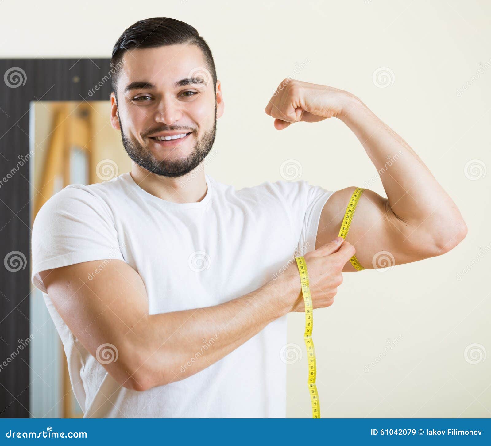 Man Measuring His Bicep and Body Stock Image - Image of clothing ...