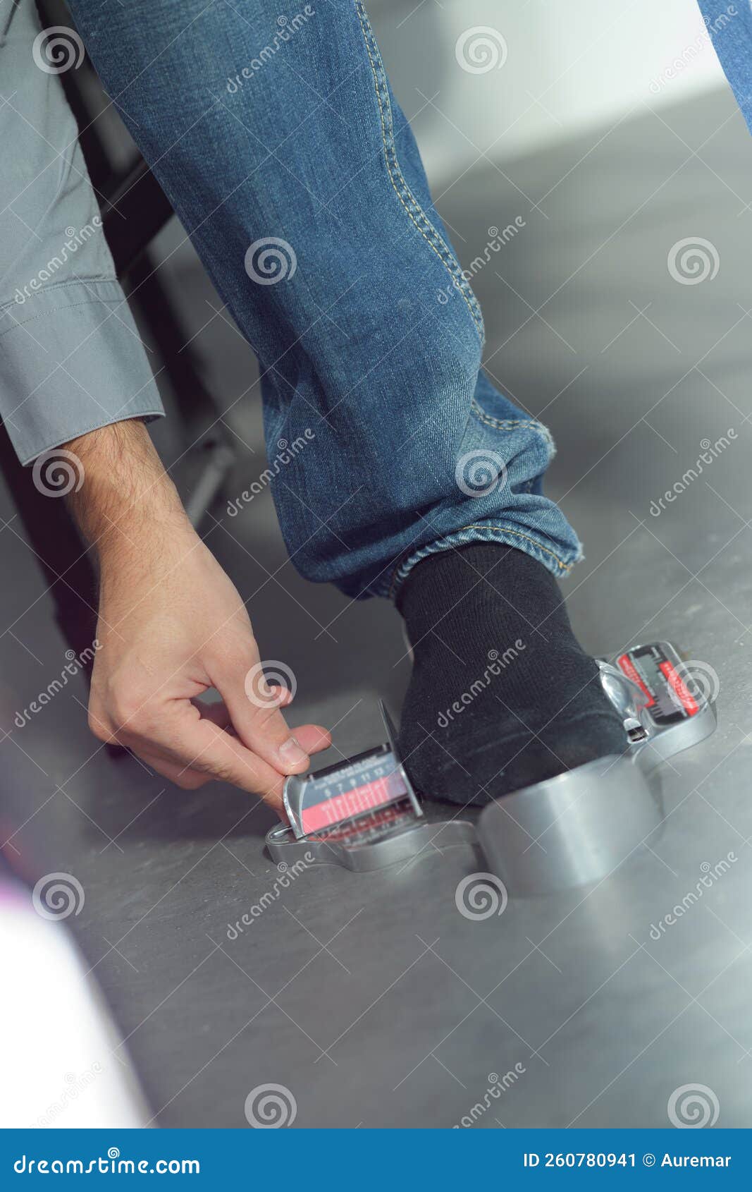 Man measuring his feet stock image. Image of buyer, client - 260780941