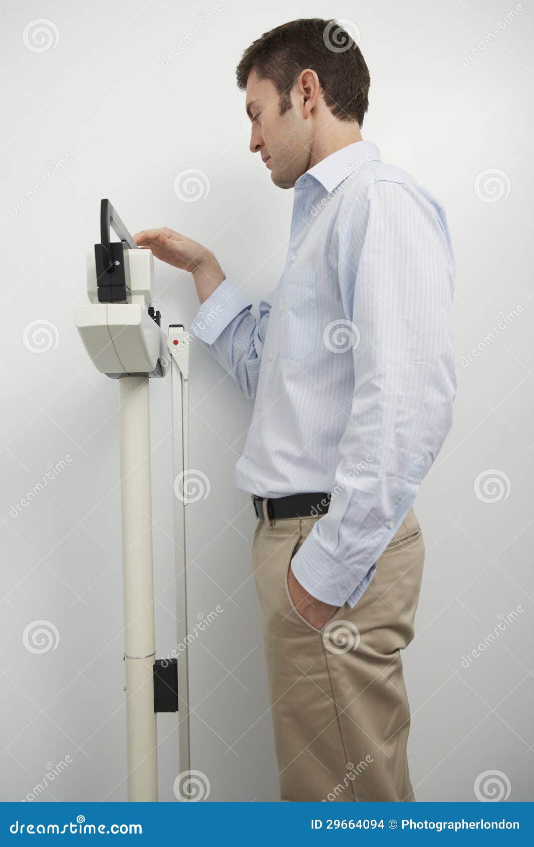 Man Measuring His Weight on Weighing Scale Stock Photo - Image of ...