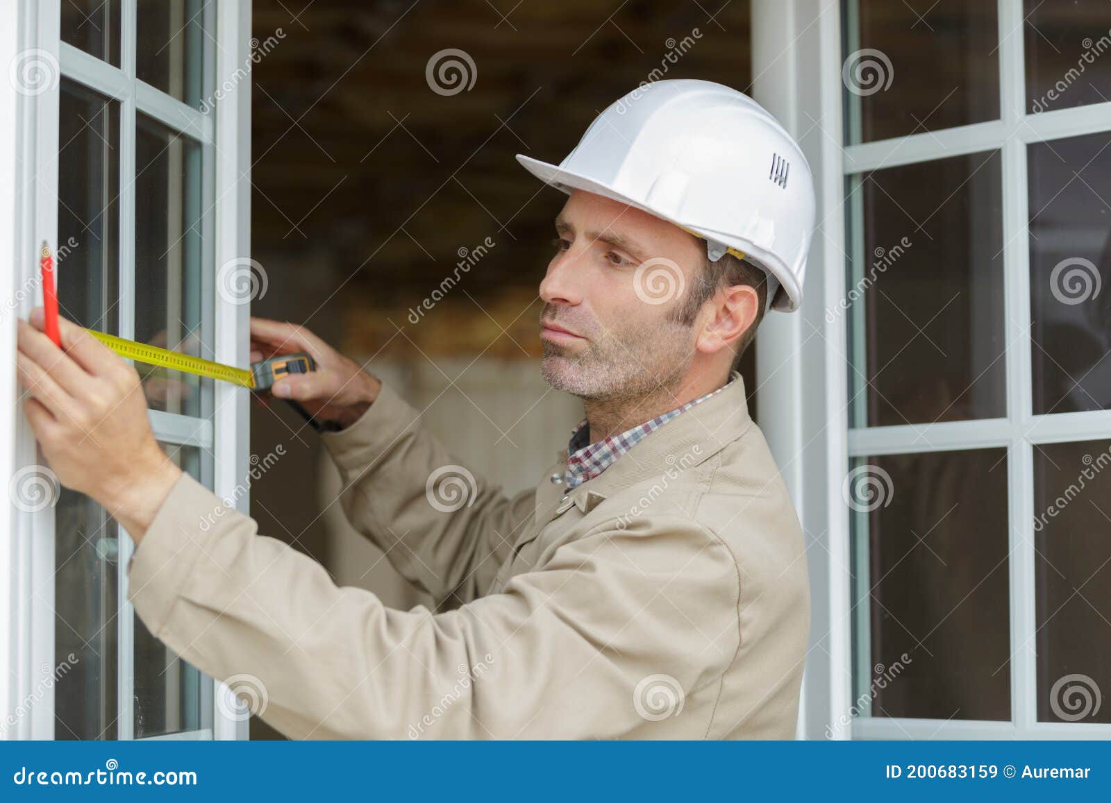 Man measuring upvc windows stock image. Image of renovation - 200683159