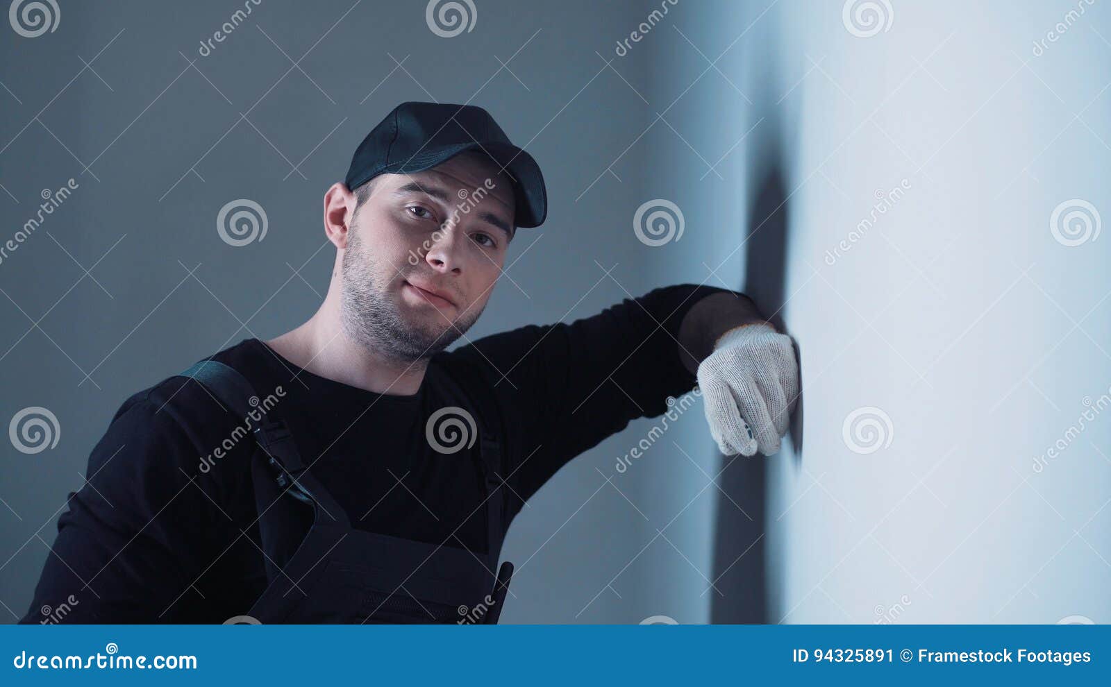 Man Measuring Wall on Construction Site Stock Image - Image of ...