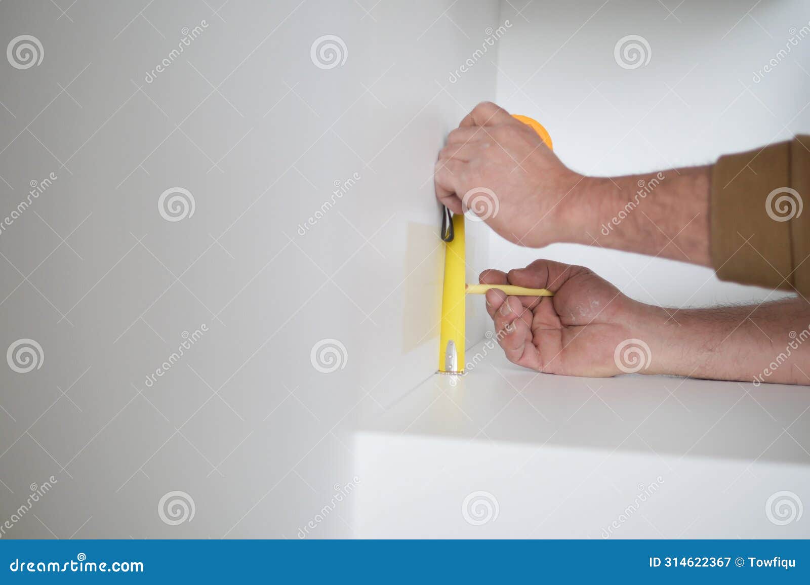 Man Measuring Wall with a Tape Measure Stock Image - Image of carpenter ...