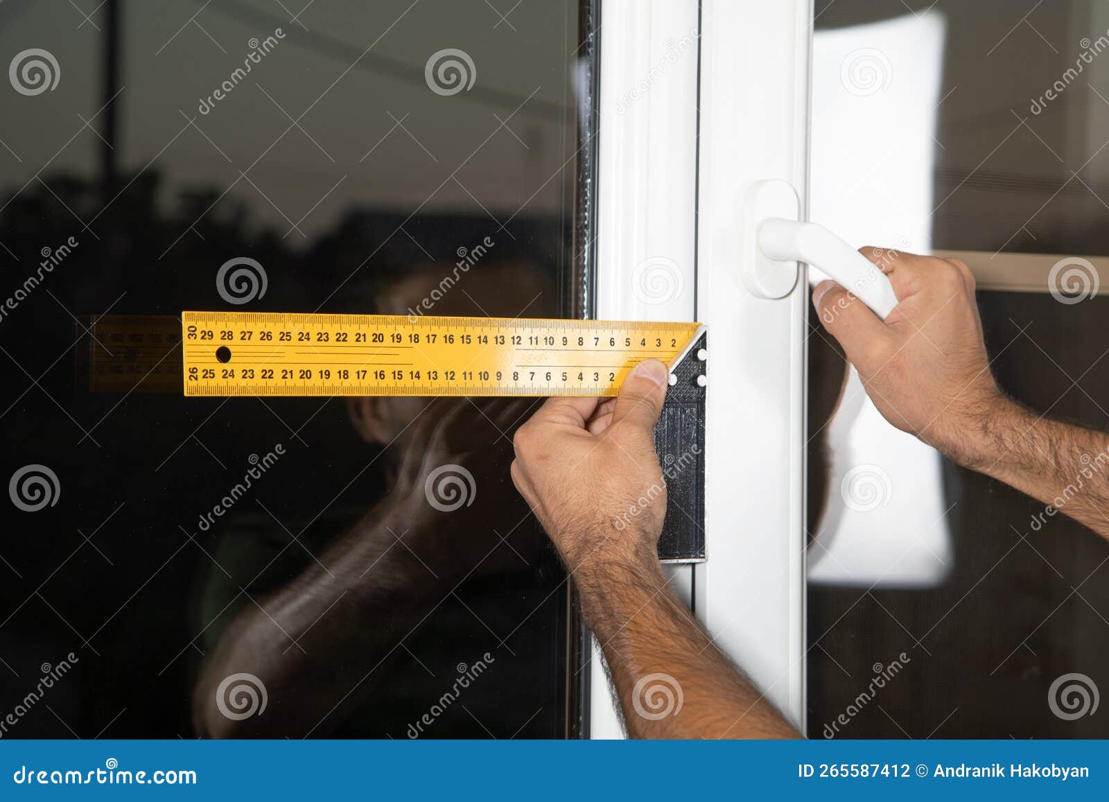 Man Measuring Window. Installing New Window in House Stock Photo ...