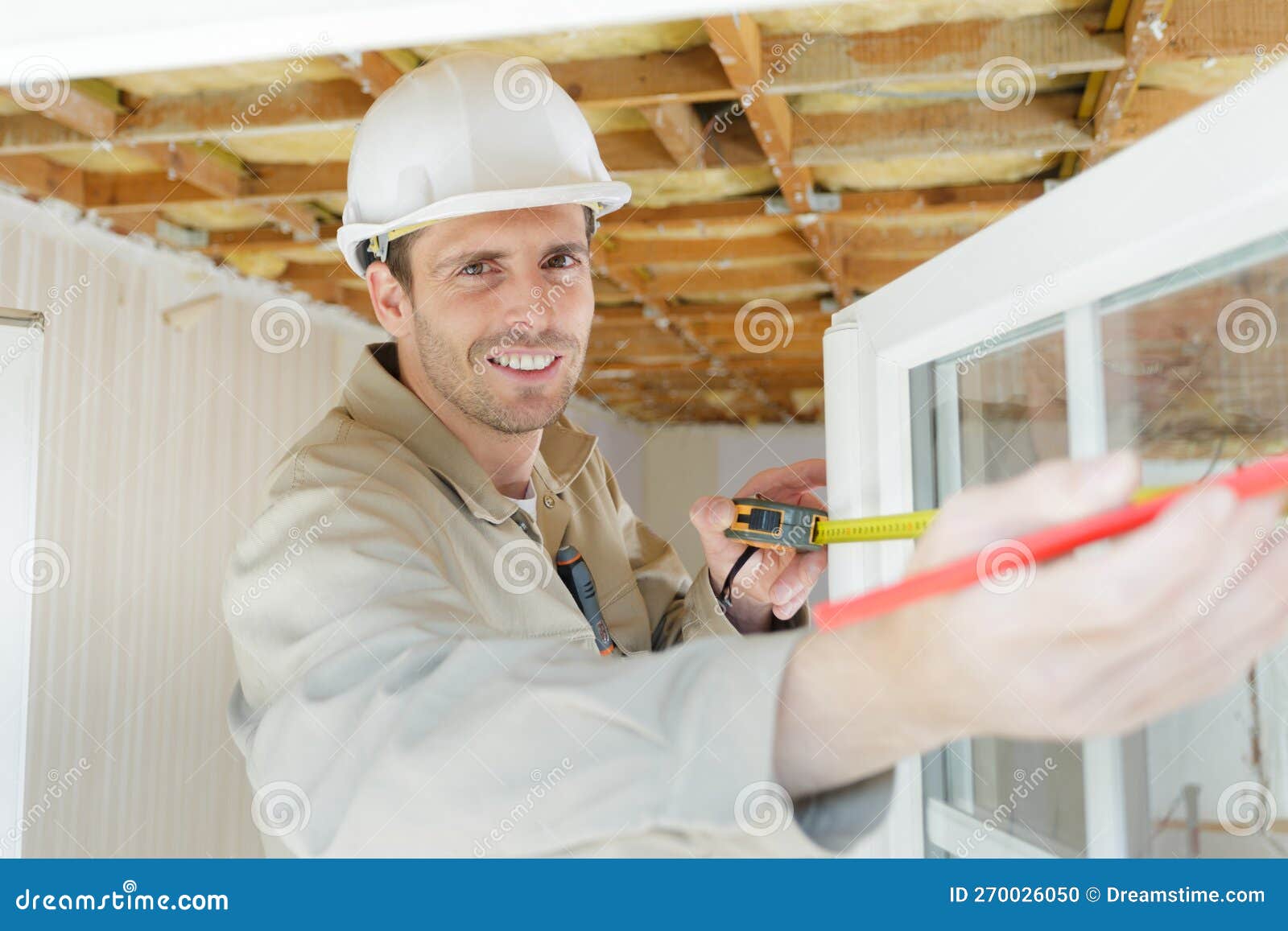 Man Measuring Window Outdoors Stock Photo - Image of youngwoman ...