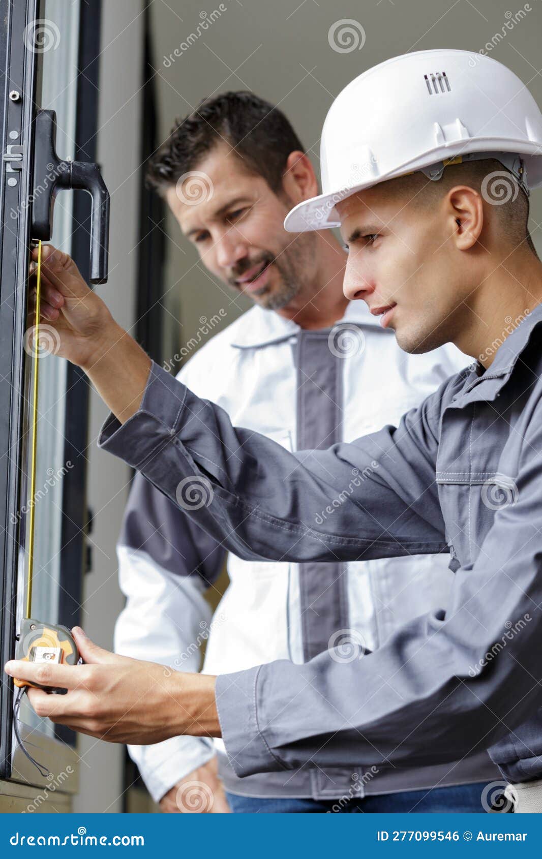 Man Measuring Window Prior To Installation Stock Photo - Image of ...