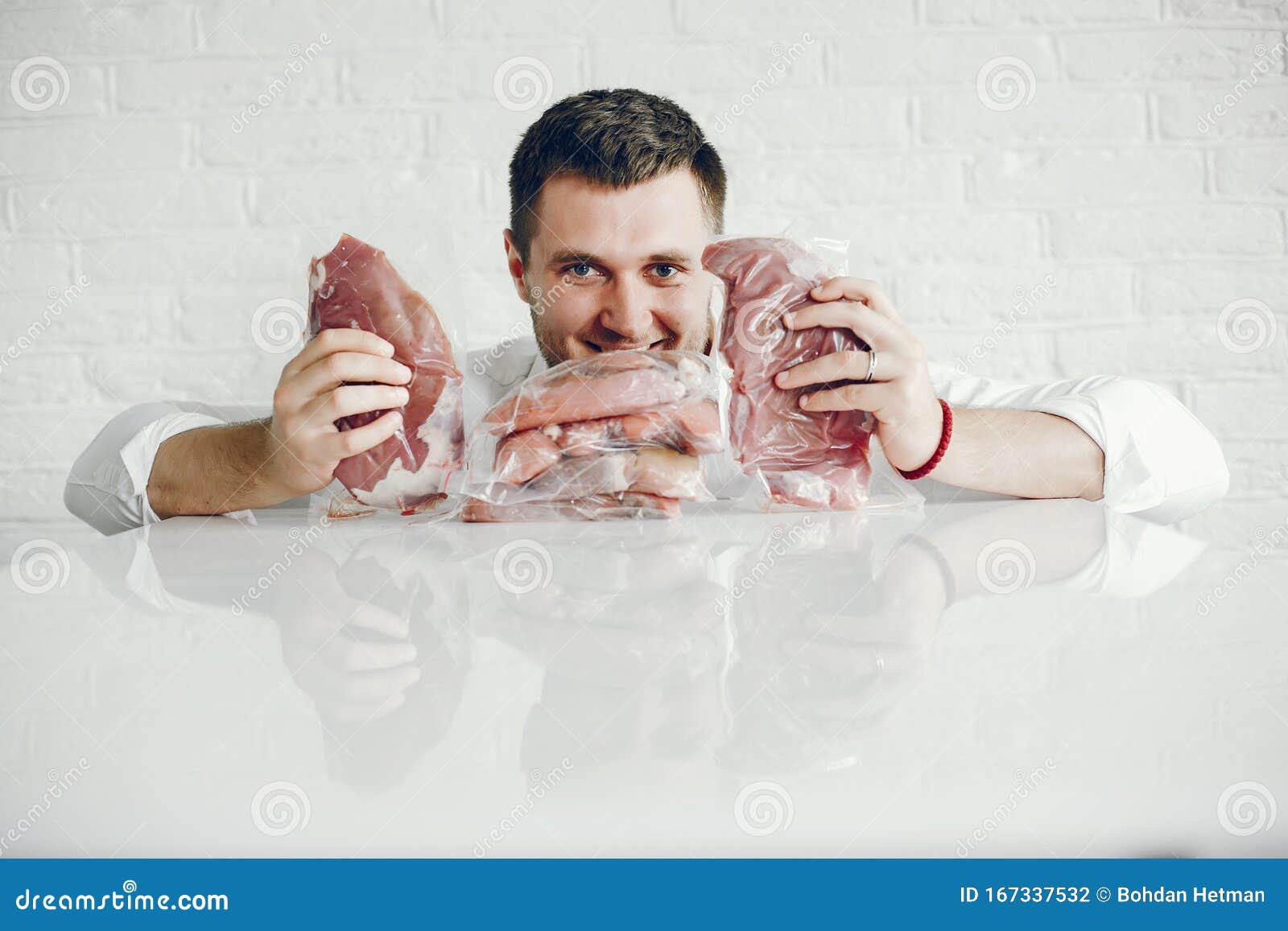 Man with meat stock photo. Image of background, person - 167337532