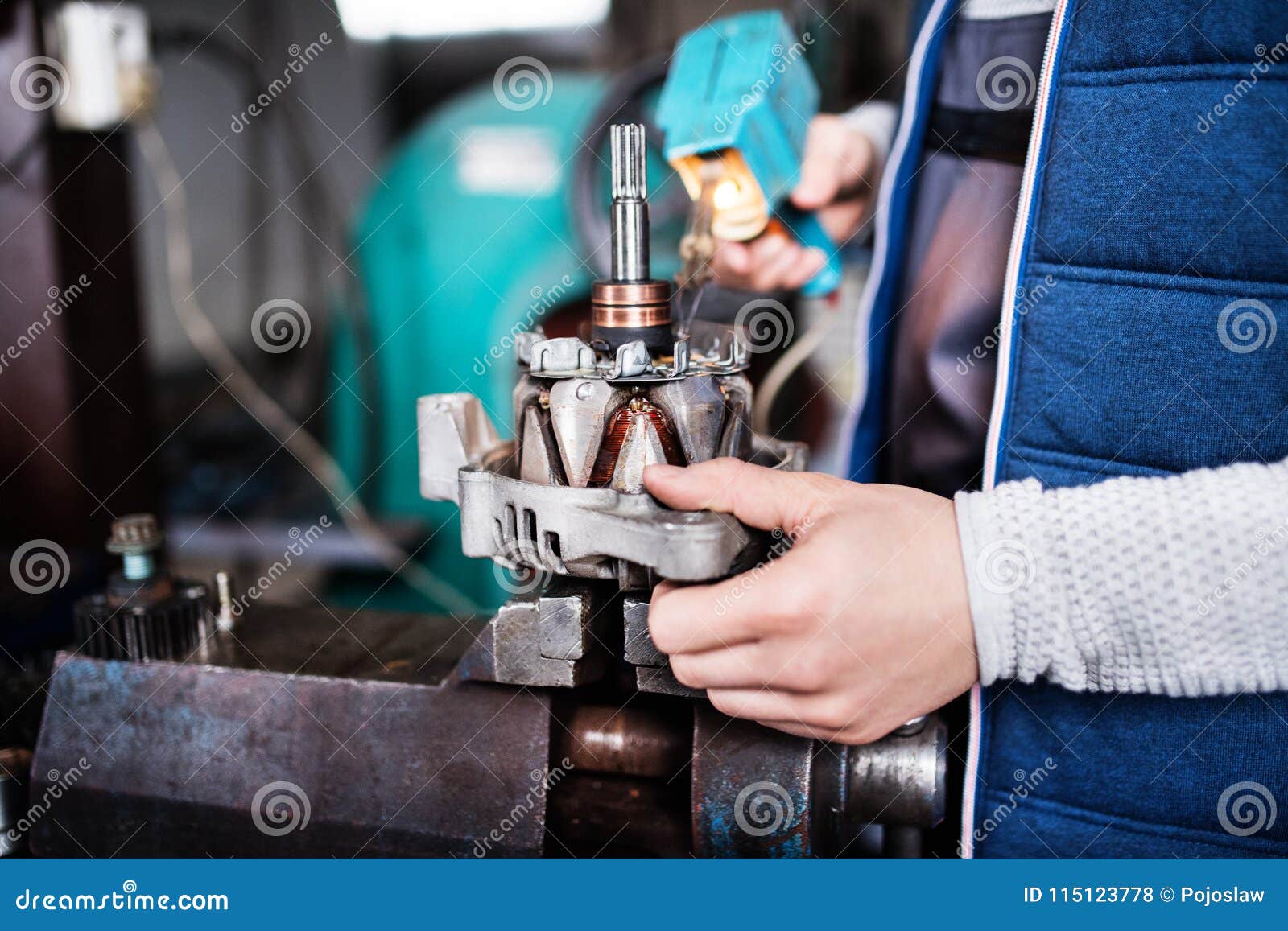 Man Mechanic Repairing a Car in a Garage. Stock Photo - Image of ...