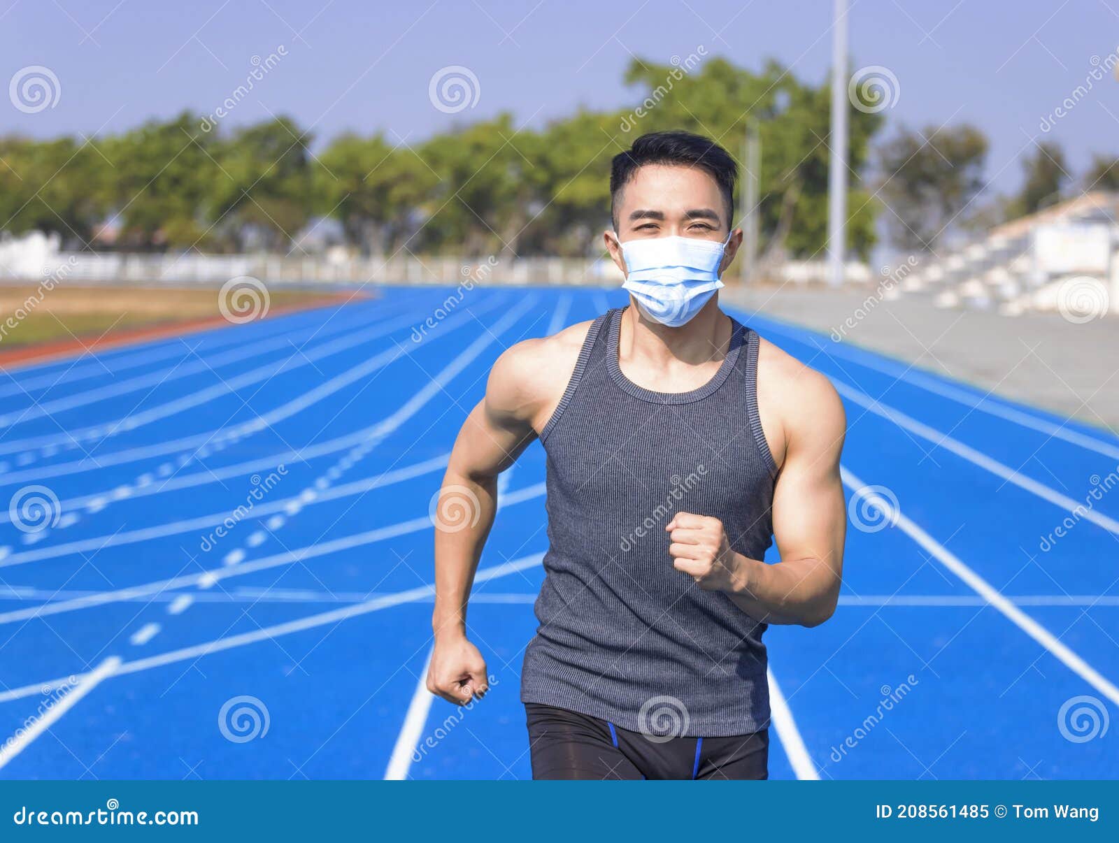 Man in Medical Mask and Running on the Track Stock Image - Image of ...