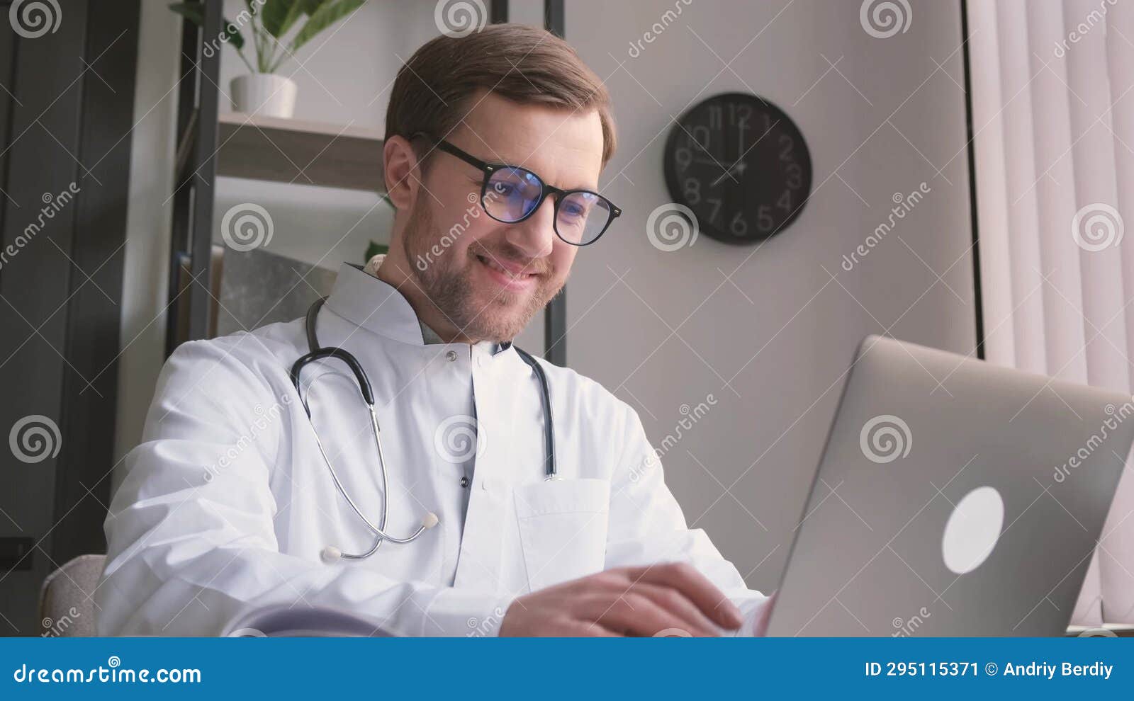 A Man in a Medical Uniform is Typing on a Computer Keyboard. Stock ...