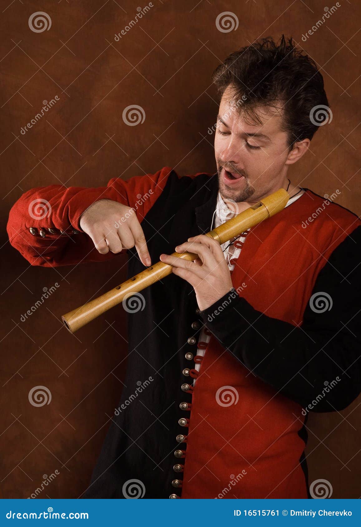 Man in a Medieval Suit Plays a Flute Stock Image - Image of human ...
