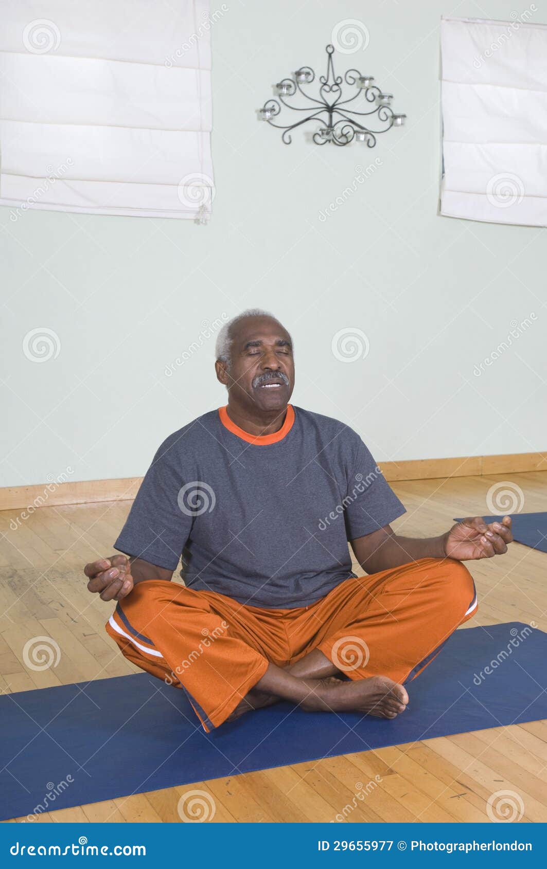 Man Meditating in Lotus Position Stock Image - Image of ethnicity, male ...