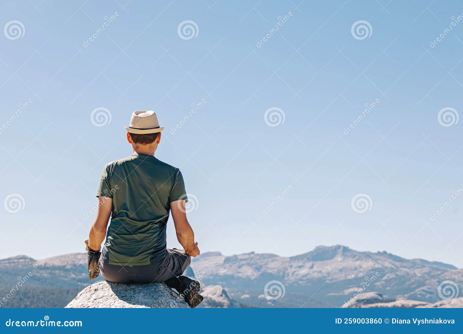 Man Meditating in the Mountains. View from the Back Stock Photo - Image ...