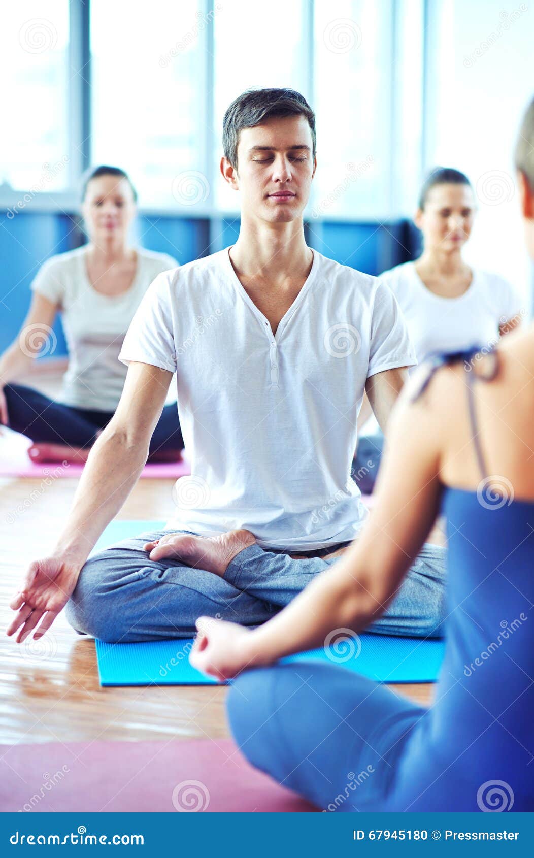 Man meditating stock photo. Image of relaxation, gymnastics - 67945180