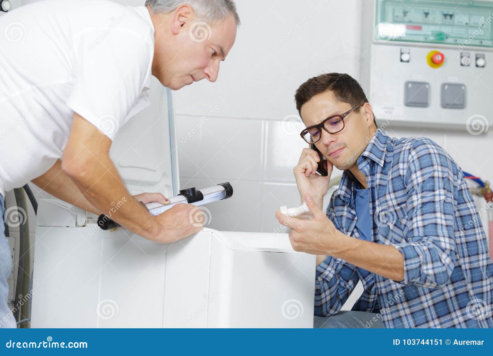 Man Mending Washing Machine Stock Image - Image of occupation ...