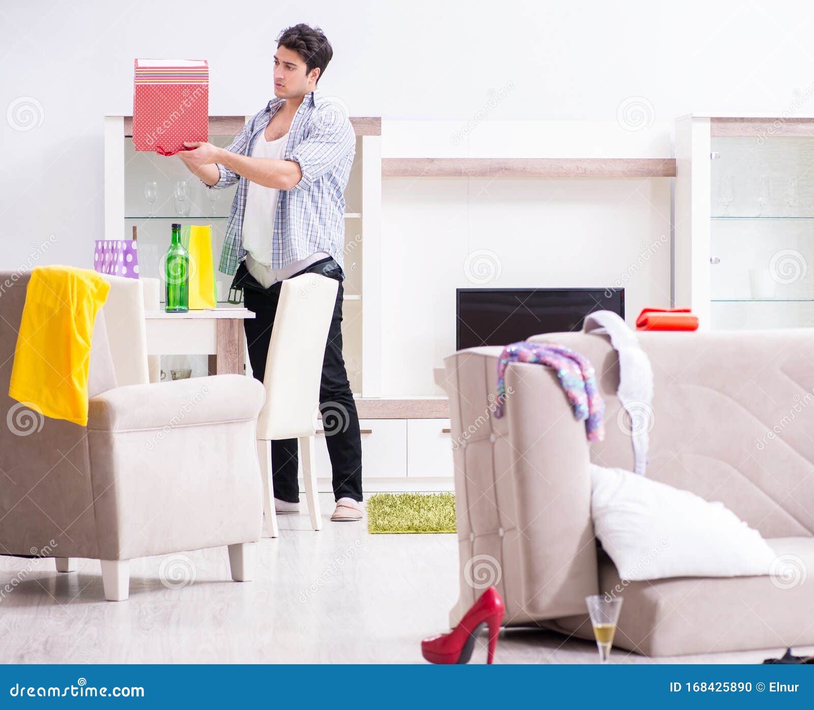 Man with Mess at Home after House Party Stock Photo - Image of ...