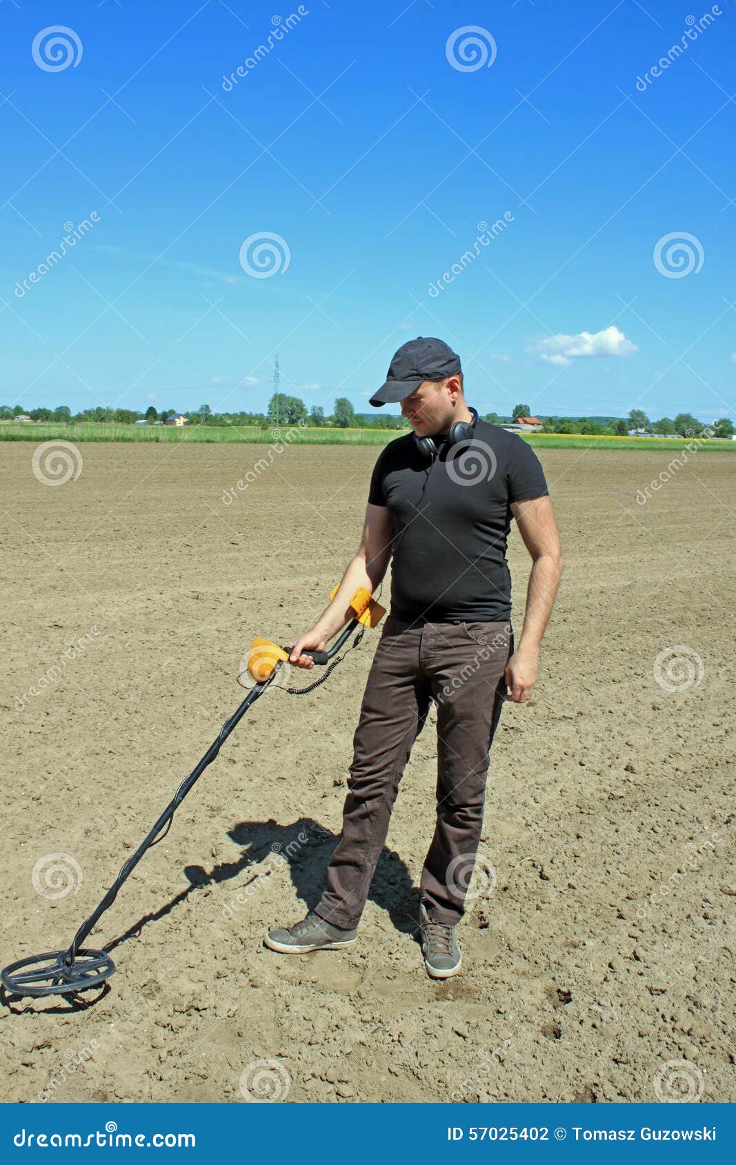 Man with metal detector stock photo. Image of archeology - 57025402