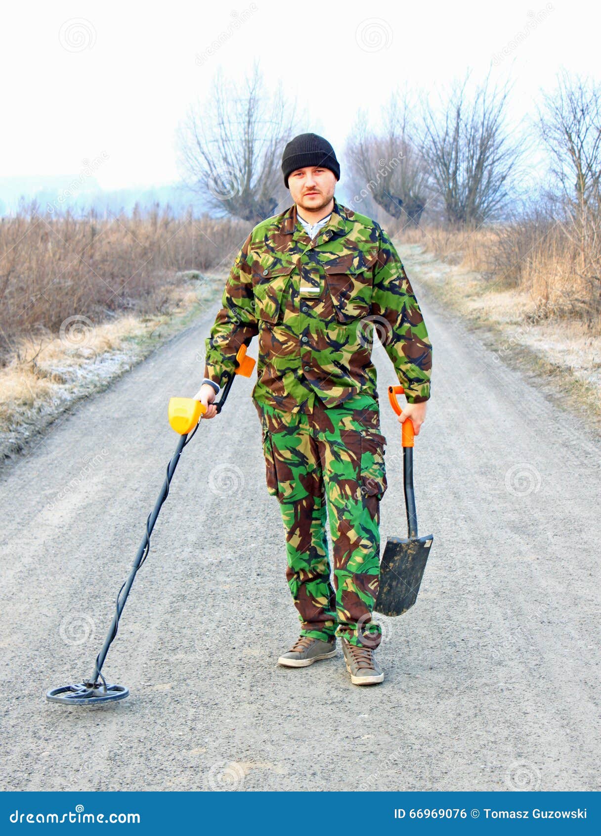 Man with metal detector . stock photo. Image of hunter - 66969076