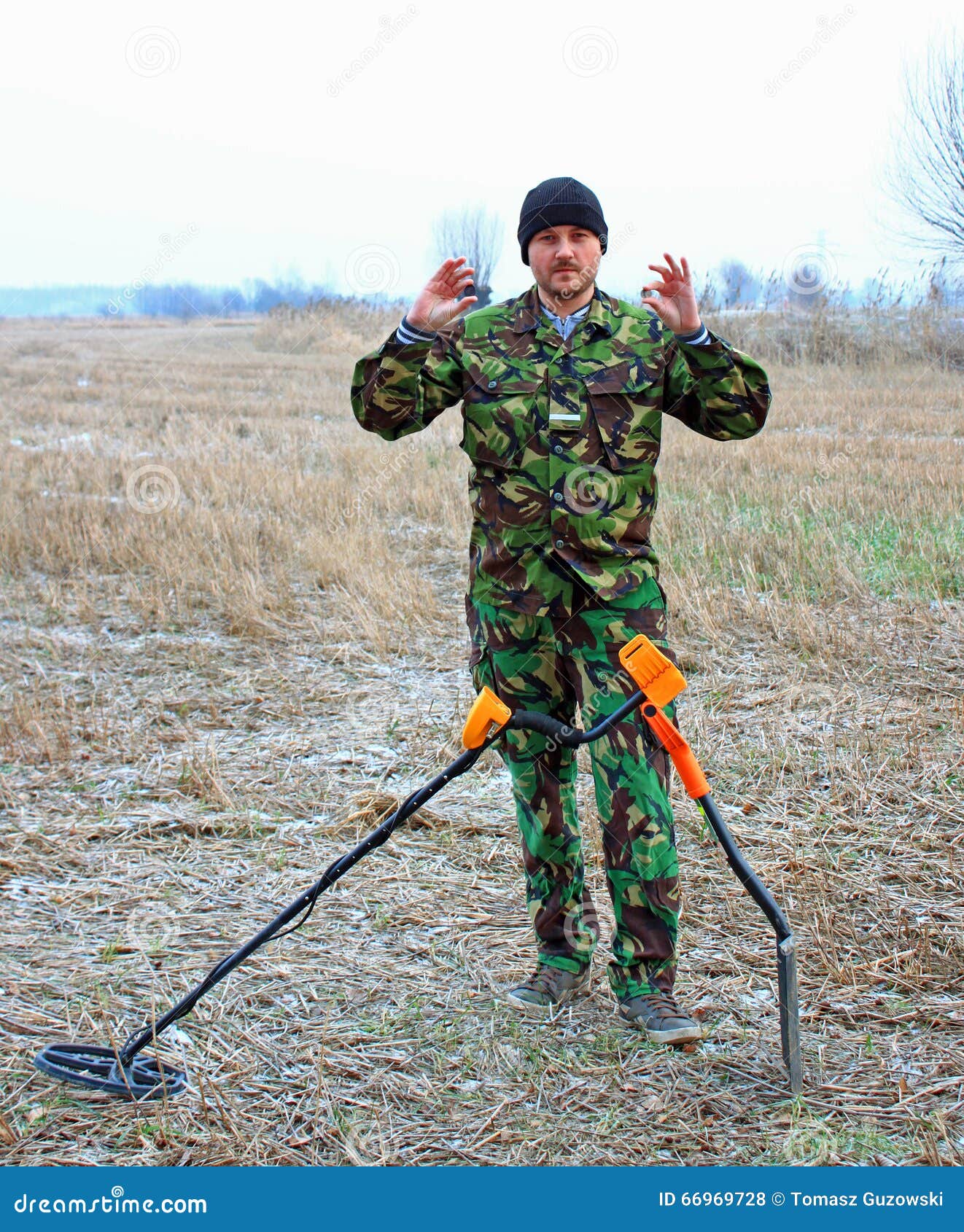 Man with metal detector . stock photo. Image of adventure - 66969728