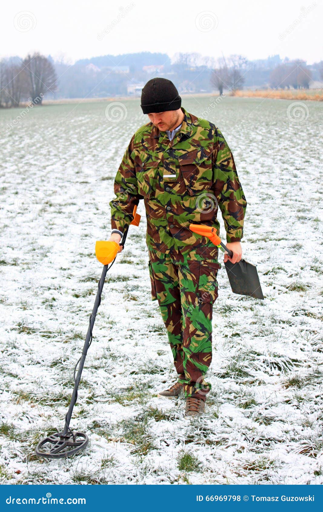 Man with metal detector . stock photo. Image of detector - 66969798