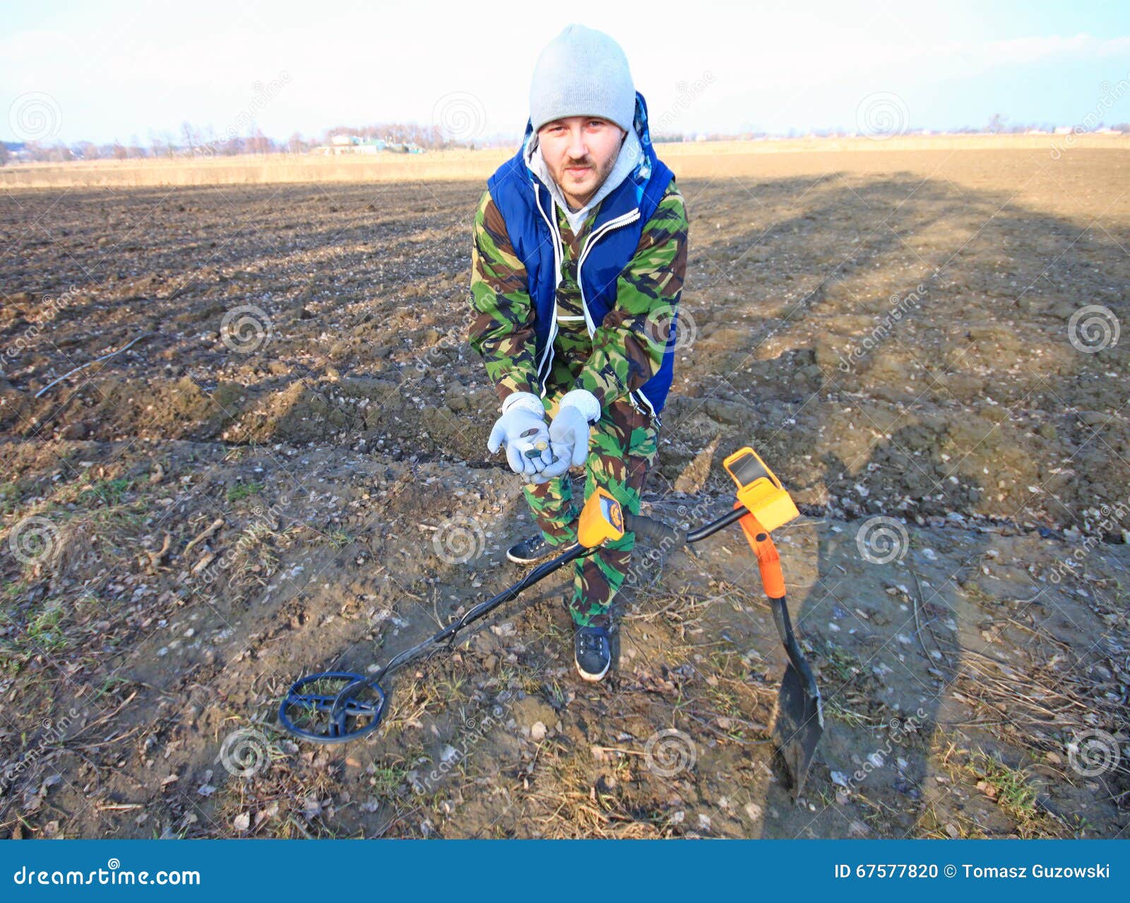 Man with metal detector . stock photo. Image of lawn - 67577820