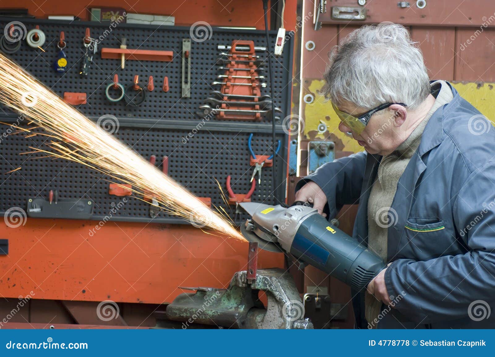Man in metal workshop stock photo. Image of cutting, cutter - 4778778