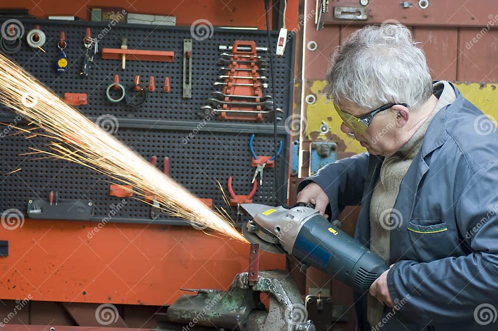 Man in metal workshop stock photo. Image of cutting, cutter - 4778778