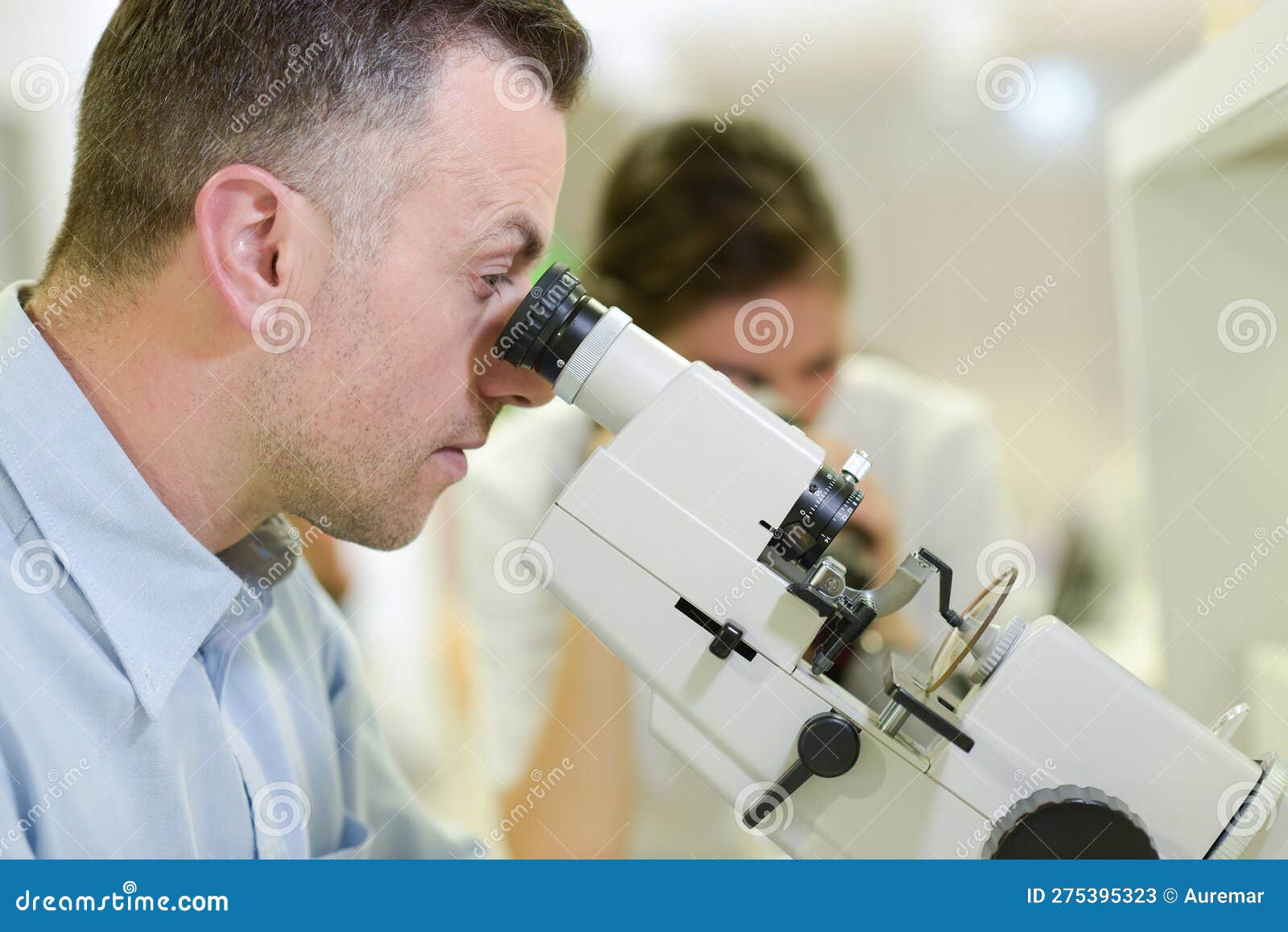 Man with Microscope in Lab at University Stock Image - Image of ...
