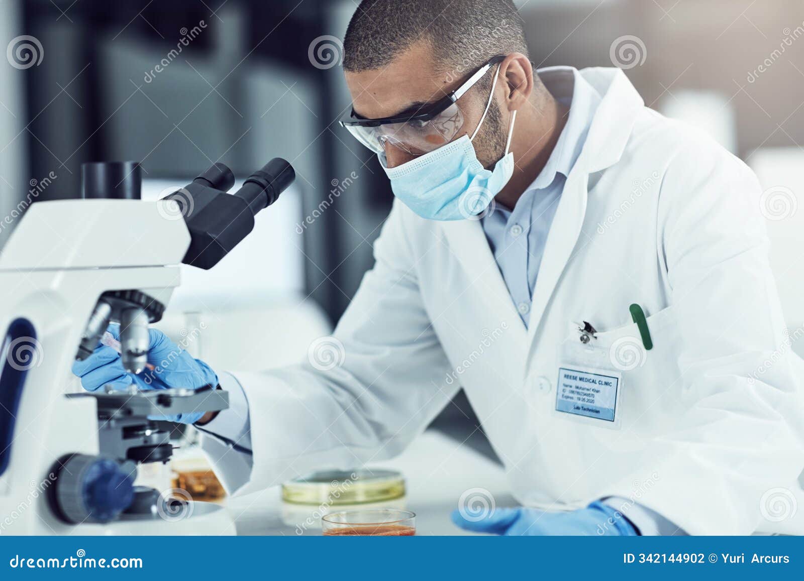 Man, Microscope and Science at Lab for Study, Ppe and Blood Sample for ...