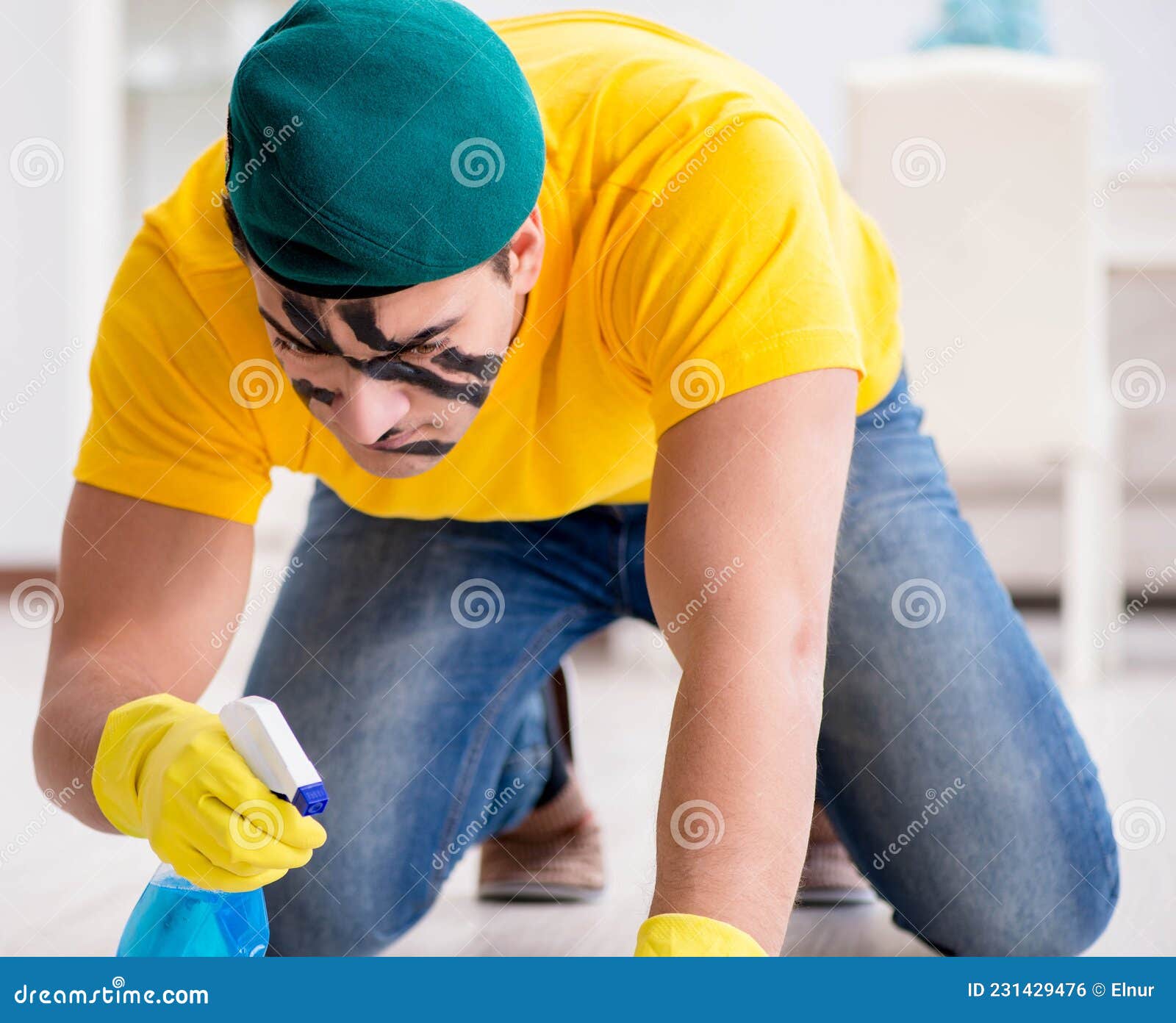 Man in Military Style Cleaning the House Stock Photo - Image of ...