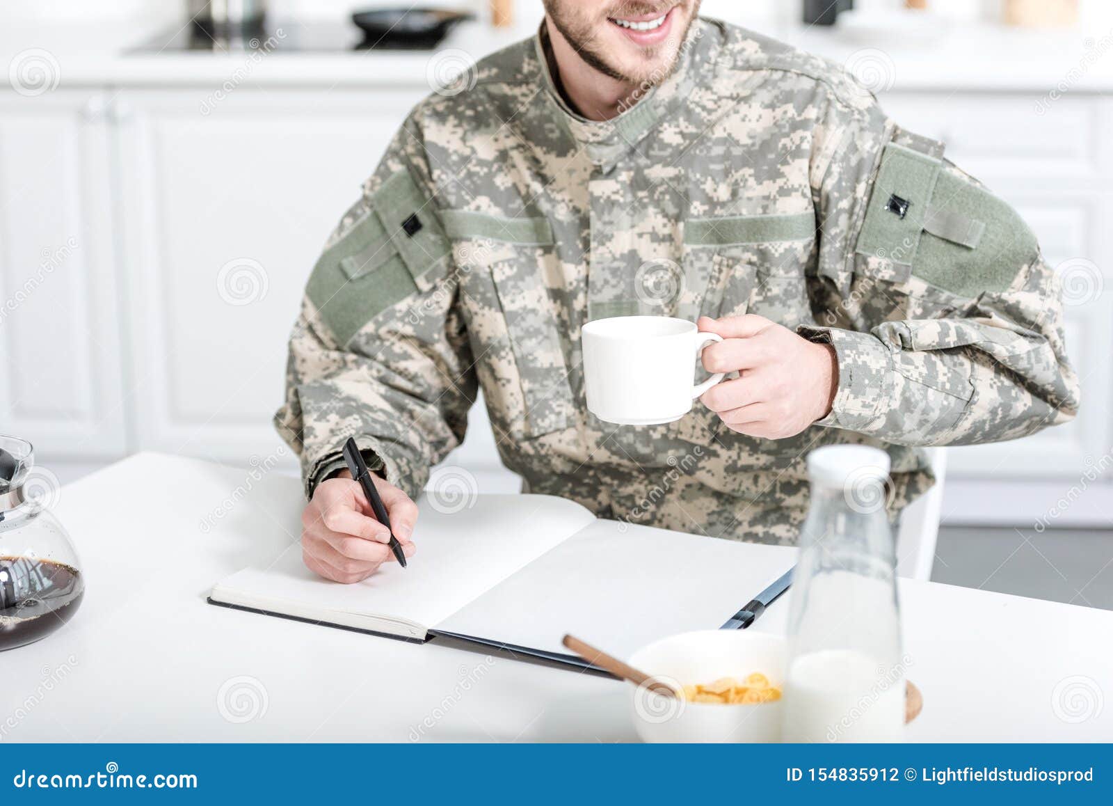 Man in Military Uniform Drink Coffee and Writing Stock Photo - Image of ...