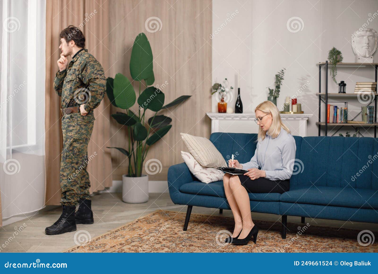 Soldier In Military Uniform Talking To Psychiatrist At Therapy Session