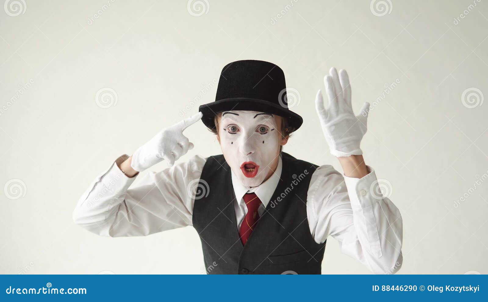 Man Mime Standing on White Background and Swears, Looking into the ...
