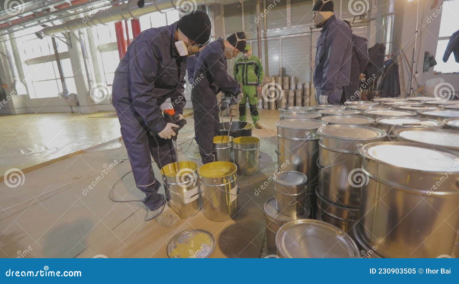 A Worker is Stirring a Self-leveling Floor in a Bucket. the Man Mixes ...