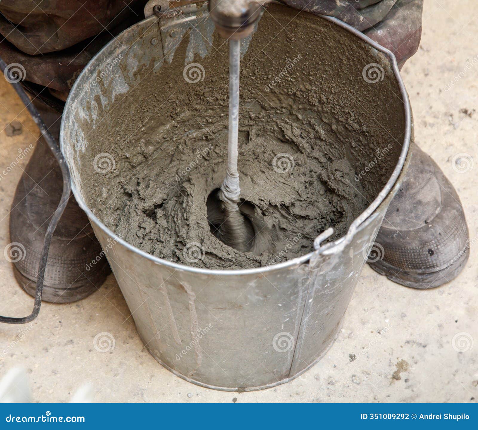 A Man is Mixing Concrete in a Bucket Stock Photo - Image of foundation ...