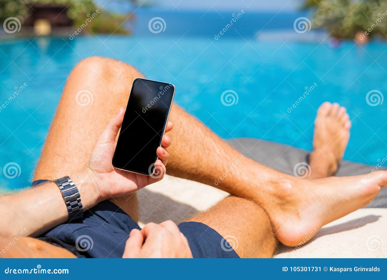 Man with Mobile Phone by the Pool Stock Image - Image of online, phone ...