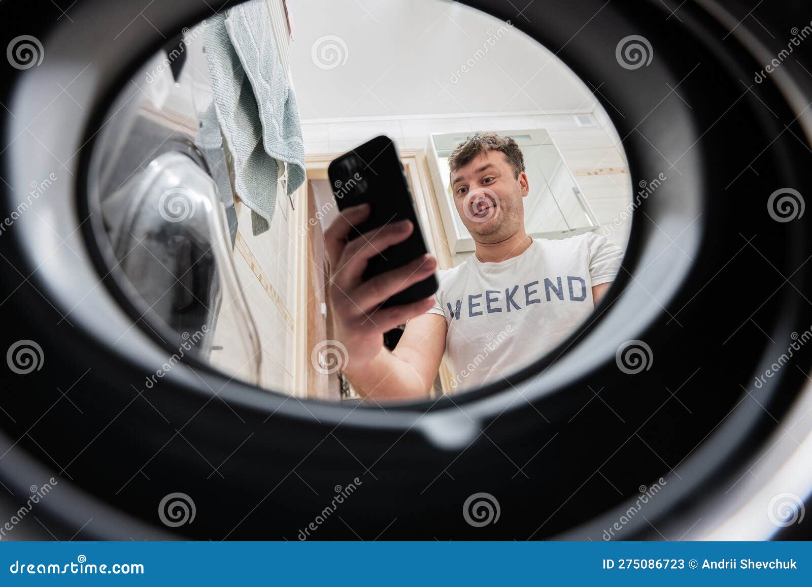 Man with Mobile Phone, View from Washing Machine Inside. Male Does ...