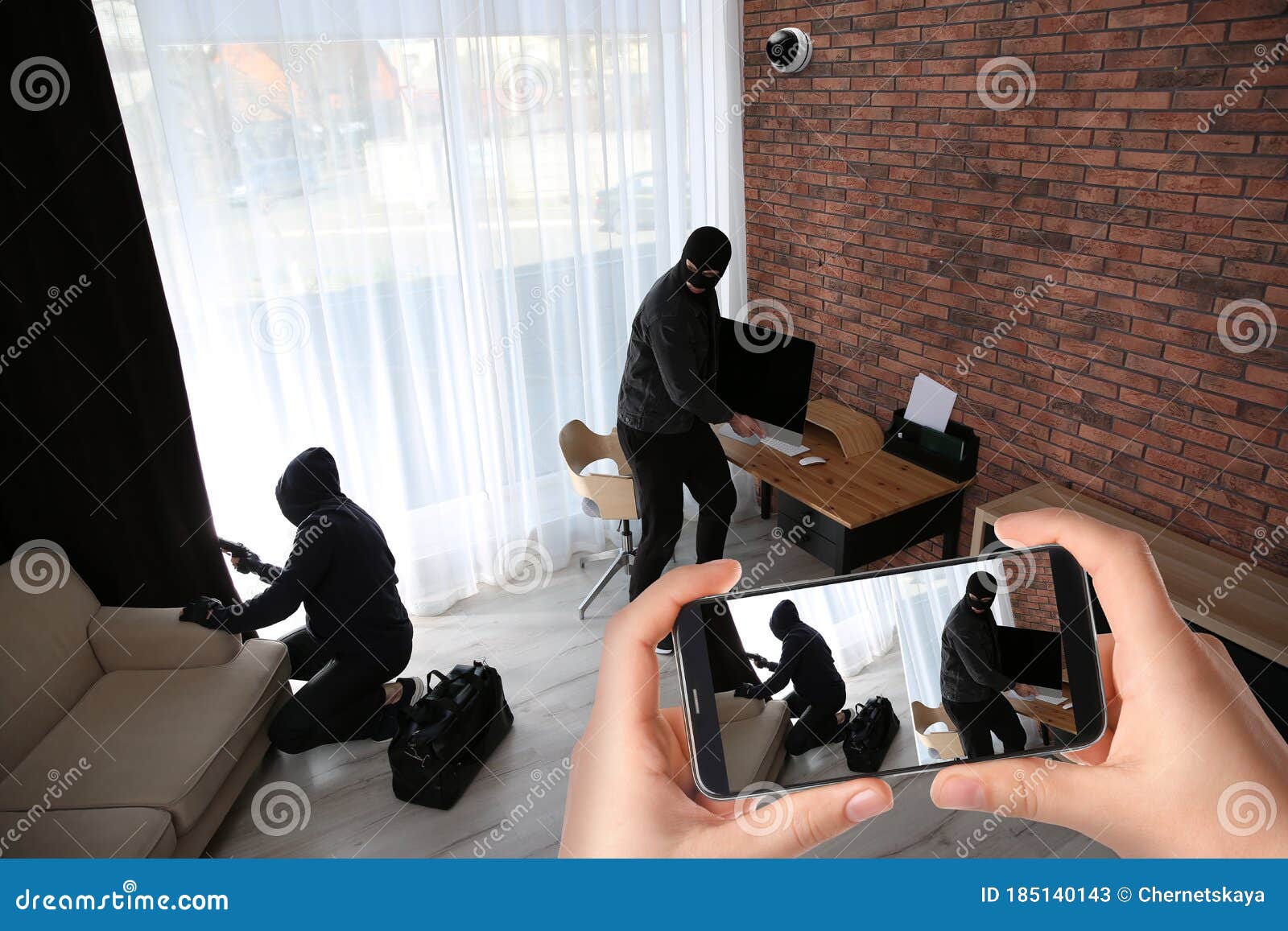 Man Monitoring Situation at His House with CCTV App on Smartphone ... Man Monitoring Situation at His House with CCTV App on Smartphone ...