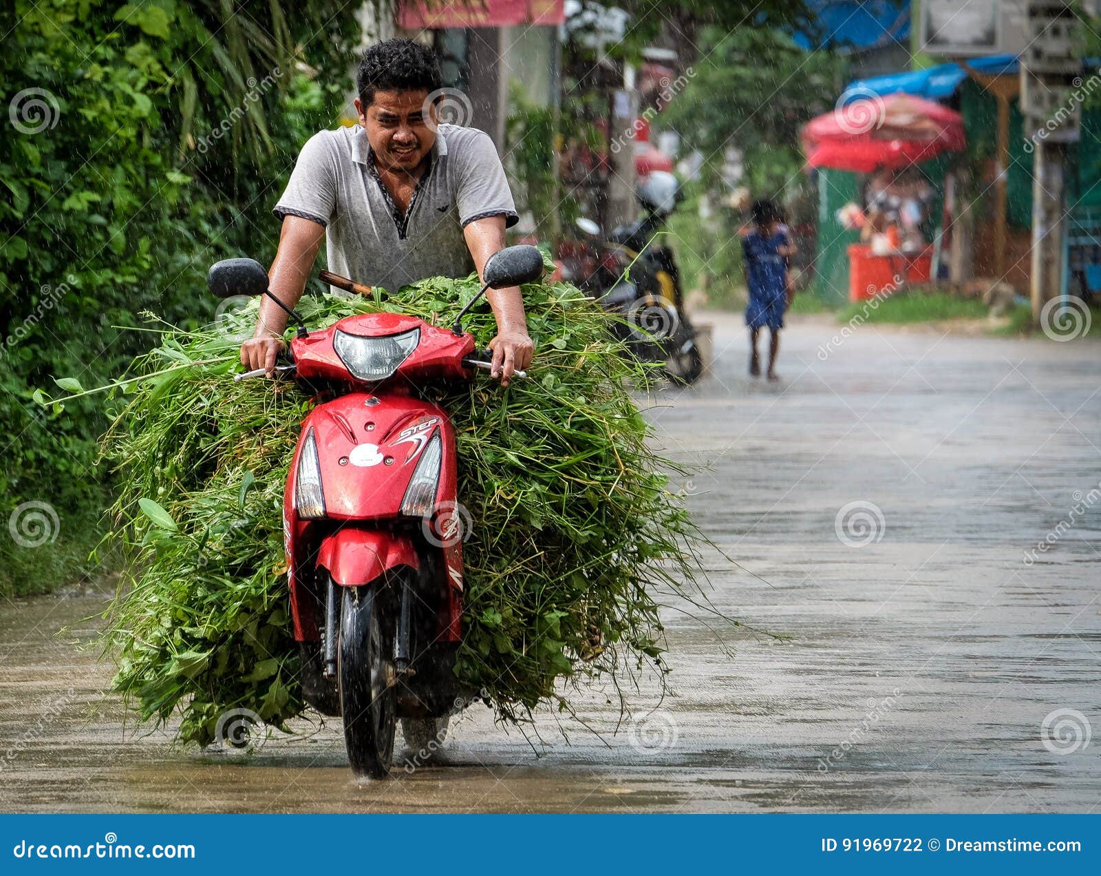 Man on Moped in Cambodia editorial photography. Image of funny - 91969722